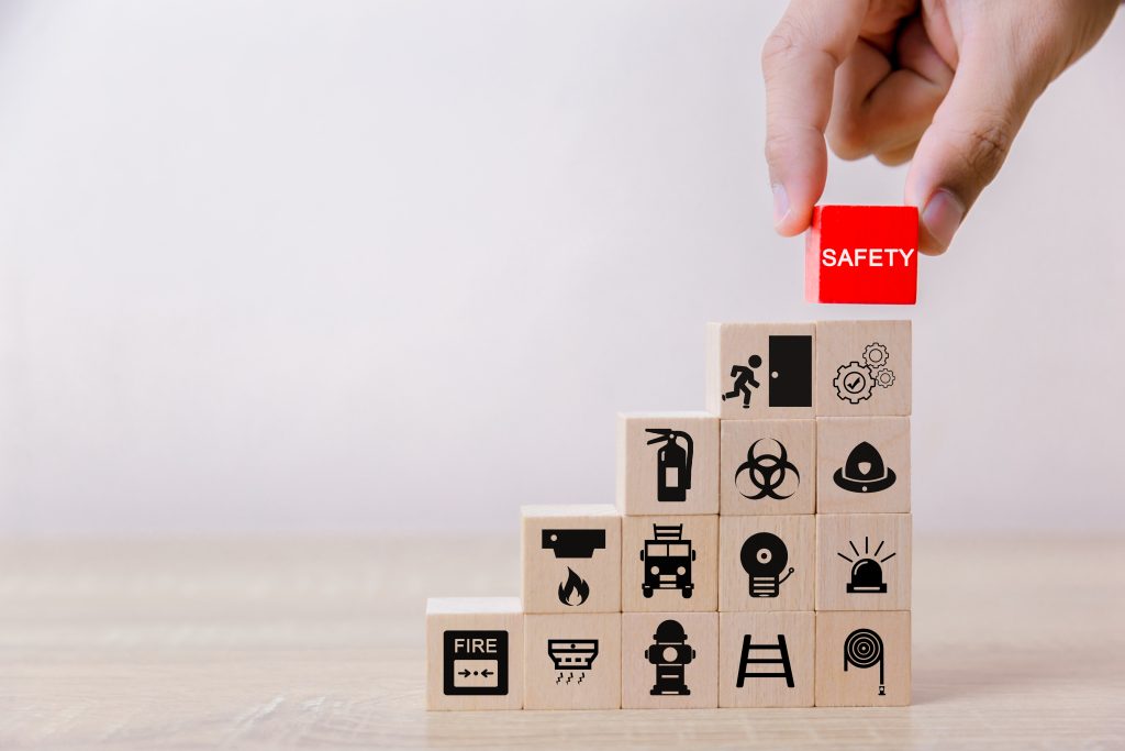 Place the wooden blocks into steps. 100 percent work safety conc ...